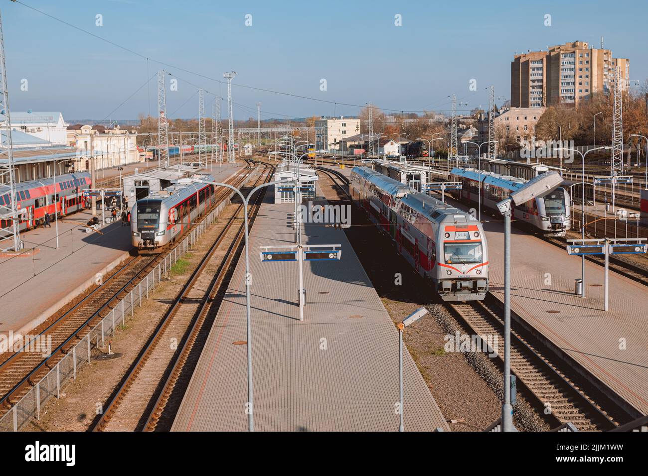 The trains in the railway station on a sunny day in Vilnius, Lithuania ...
