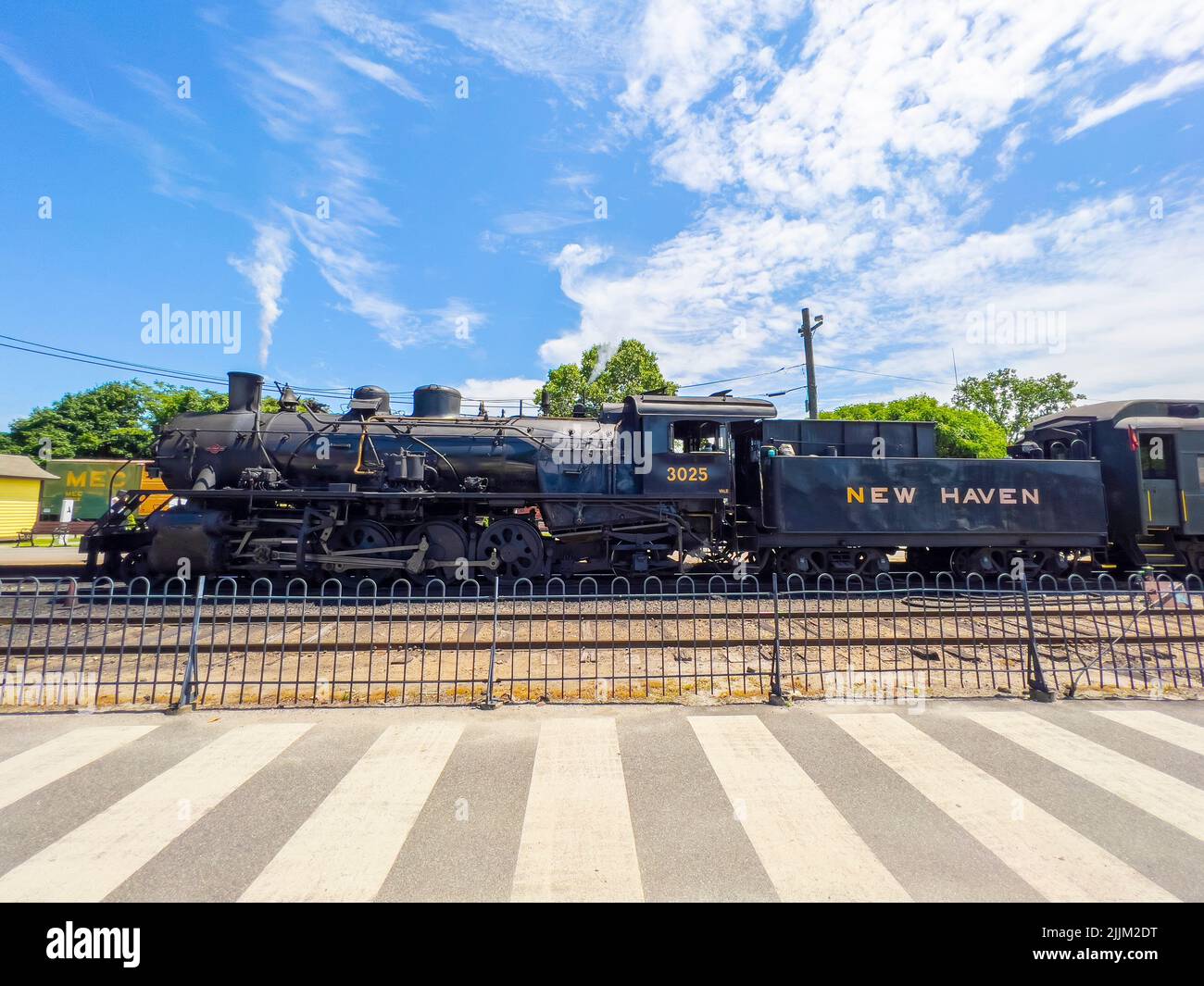 Essex Steam Train locomotive at historic Essex Station in town of Essex ...