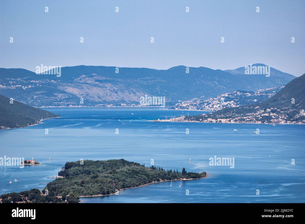 A mesmerizing view of mountains in Kotor bay in Montenegro Stock Photo ...