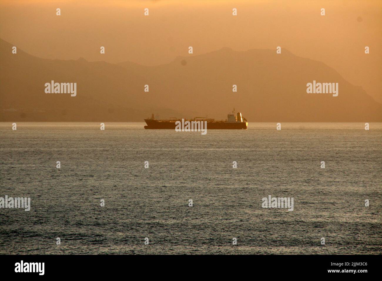 Container ship during sunset hi-res stock photography and images - Alamy