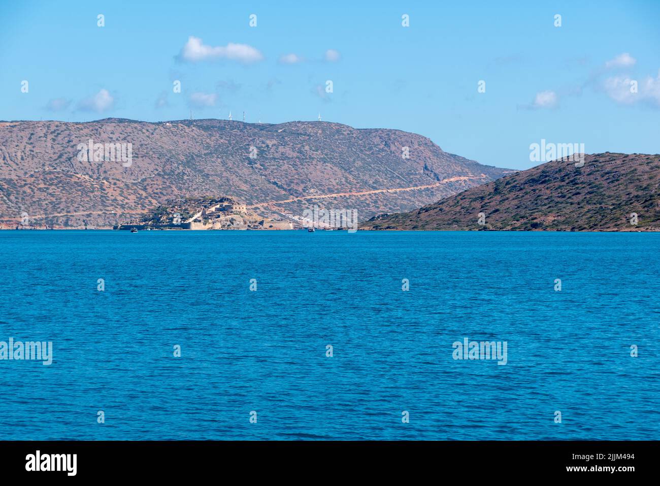 The beautiful shot of mountain town landscape with turquoise lake water ...