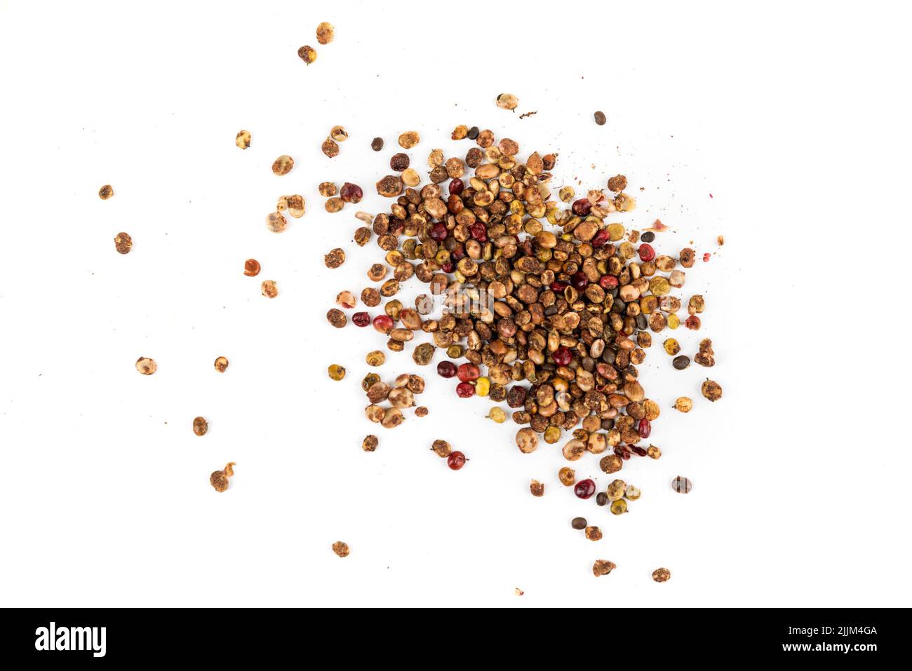 Whole dried sumac berries scattered pile isolated over white Stock ...