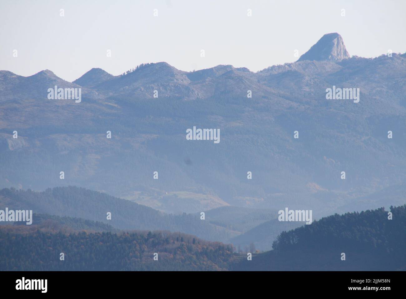 A beautiful view of the foggy mountains in the Basque Country Stock ...