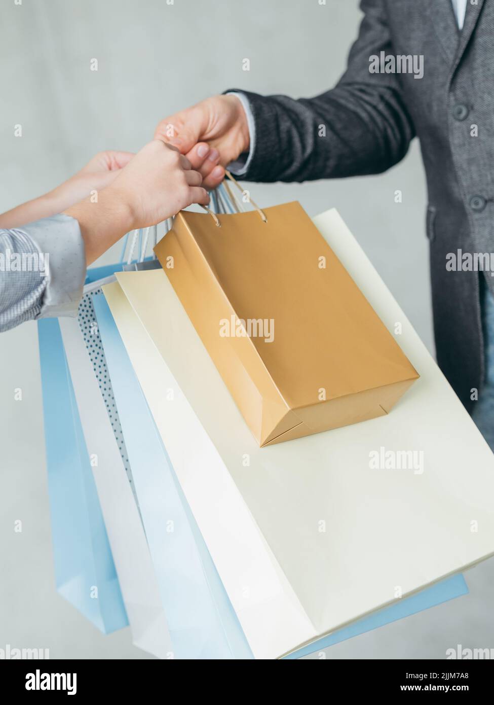 online shopping delivery man pass bags purchase Stock Photo - Alamy