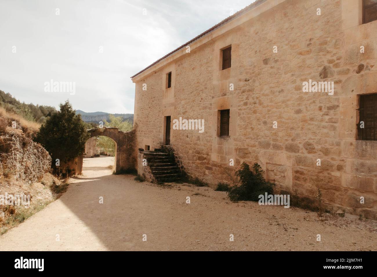 A side view of an ancient monastery in mountains in Burgos, Spain Stock ...