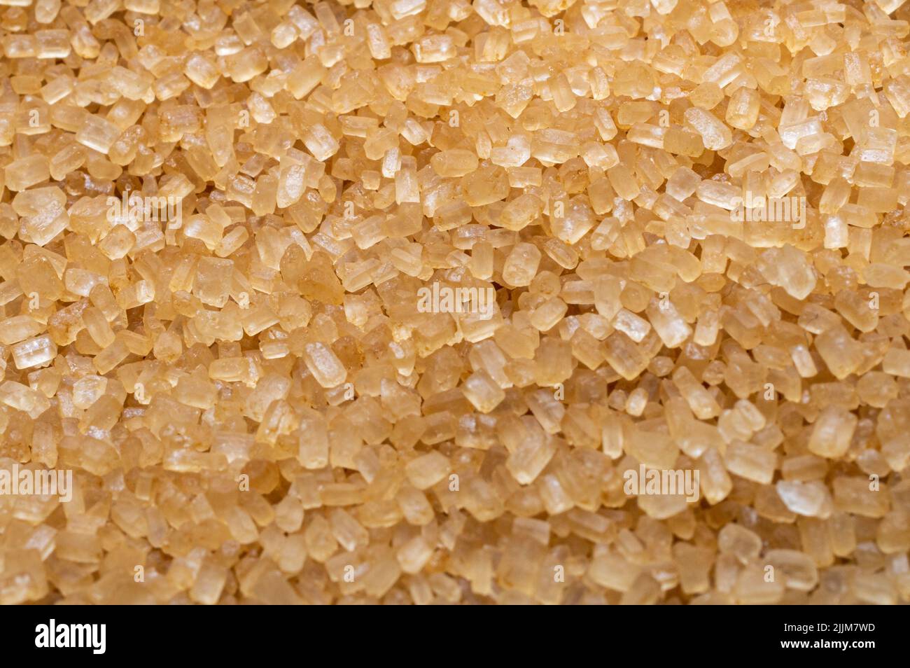 A textured background of cane sugar Stock Photo - Alamy