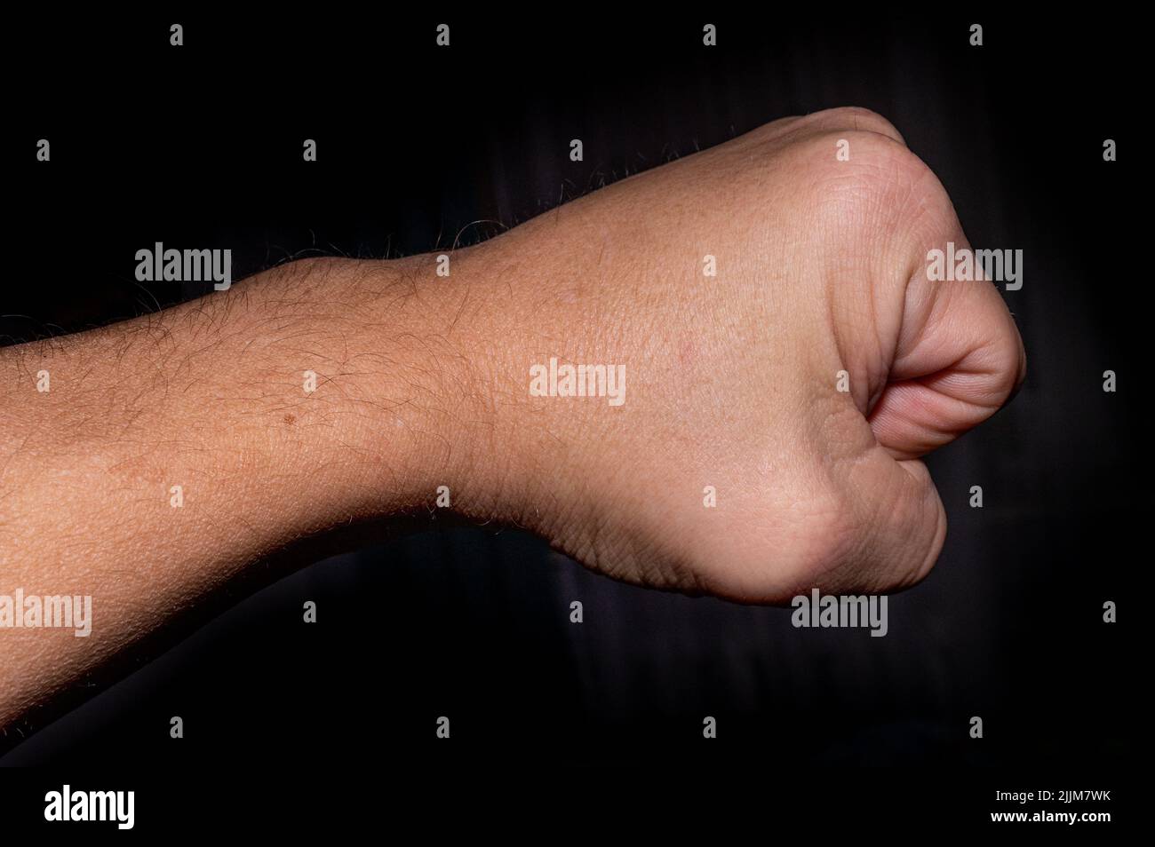 A closeup of a hand in a fist Stock Photo - Alamy