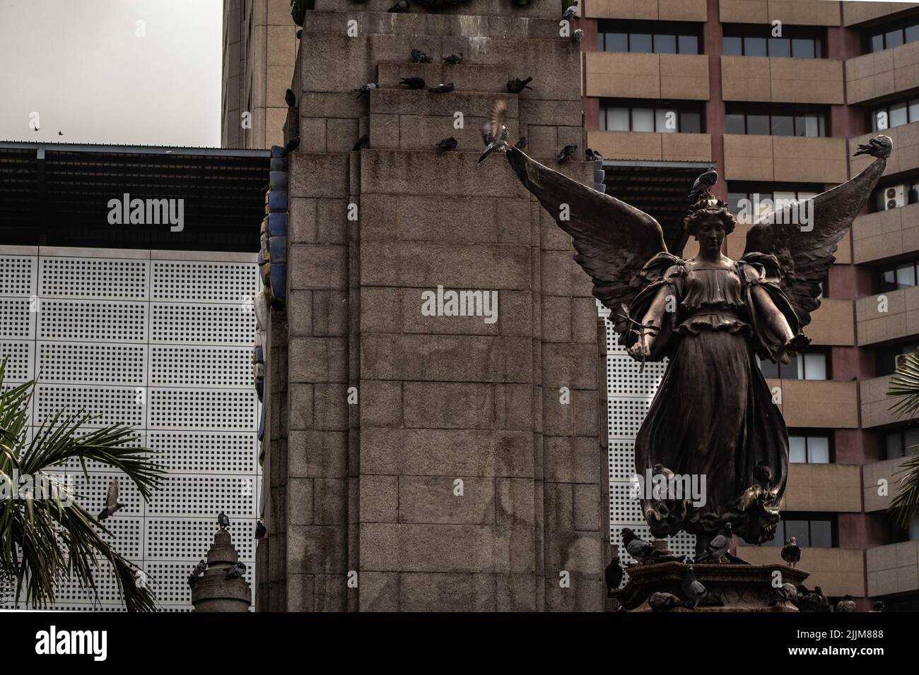 A view of the angel sculpture in front of the building Stock Photo - Alamy