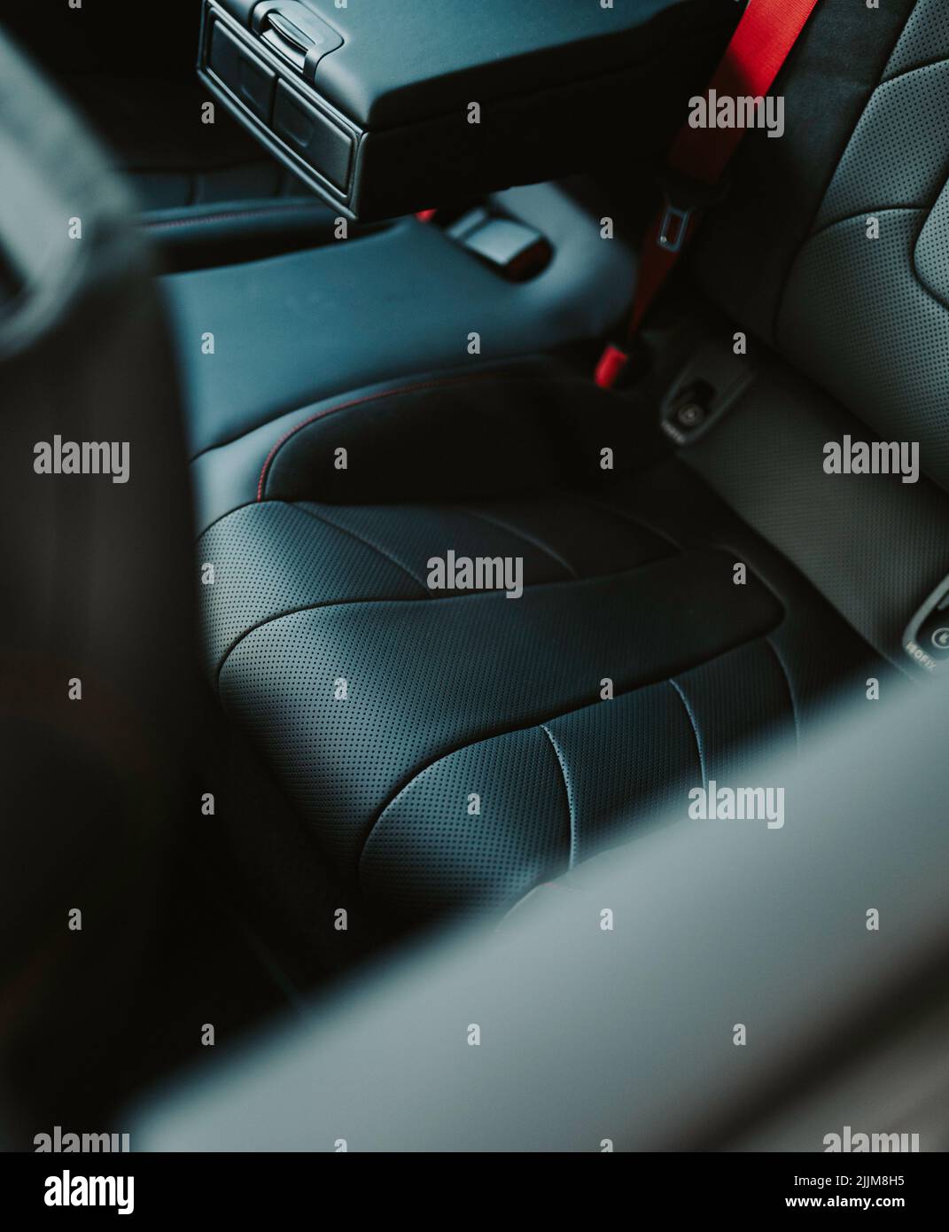 A vertical shot of leather seats a luxury black car showroom Stock ...