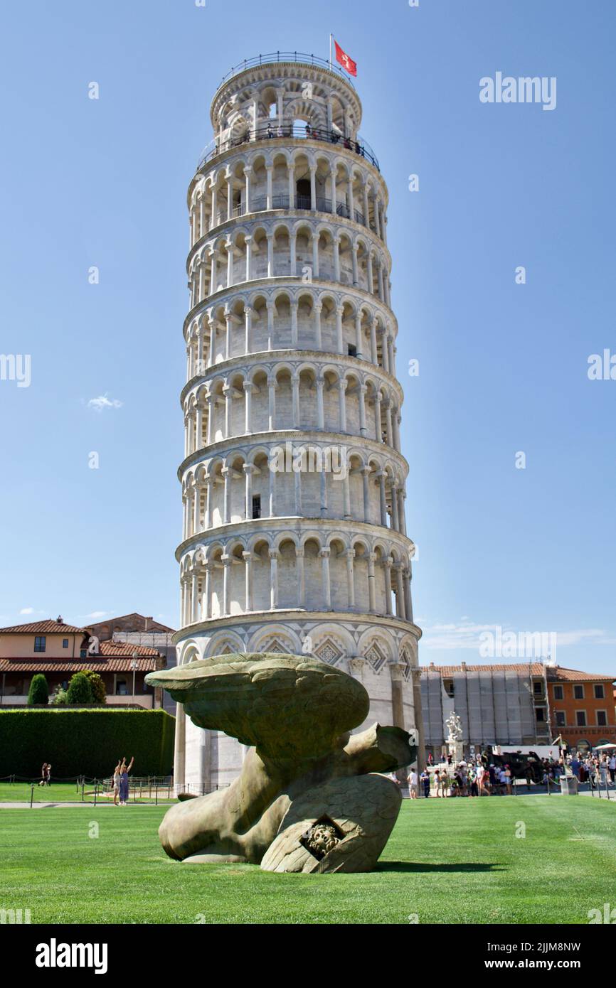 A vertical shoto of the Leaning Tower of Pisa and the Angelo Caduto ...