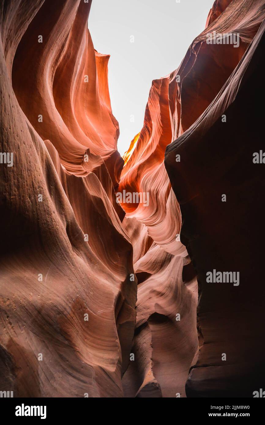 A vertical shot of the sandstone walls of Antelope Canyon in Arizona ...