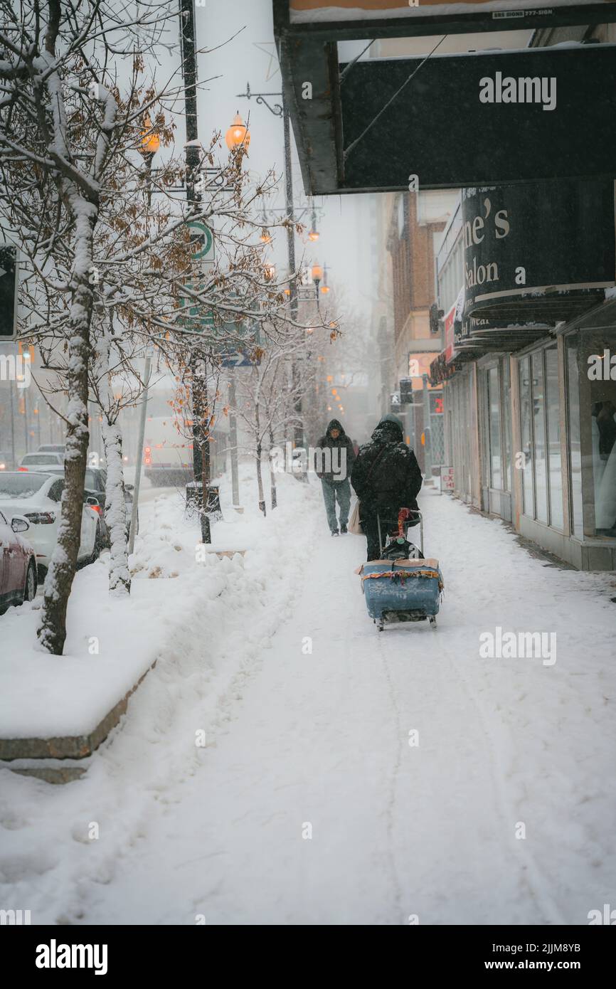 The people walking on the snowy streets Stock Photo - Alamy