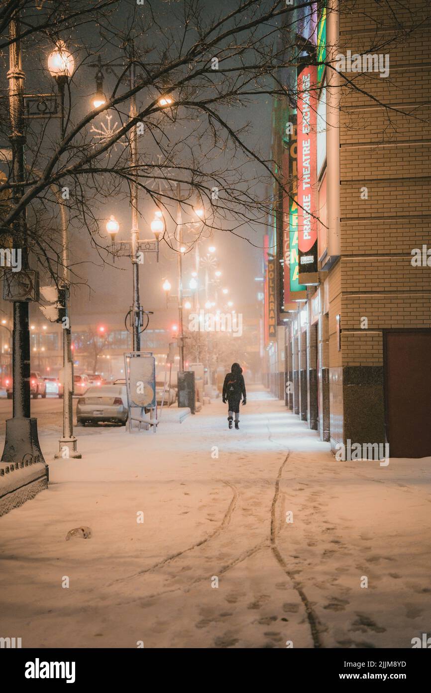 Man walking night in snowy hi-res stock photography and images - Alamy