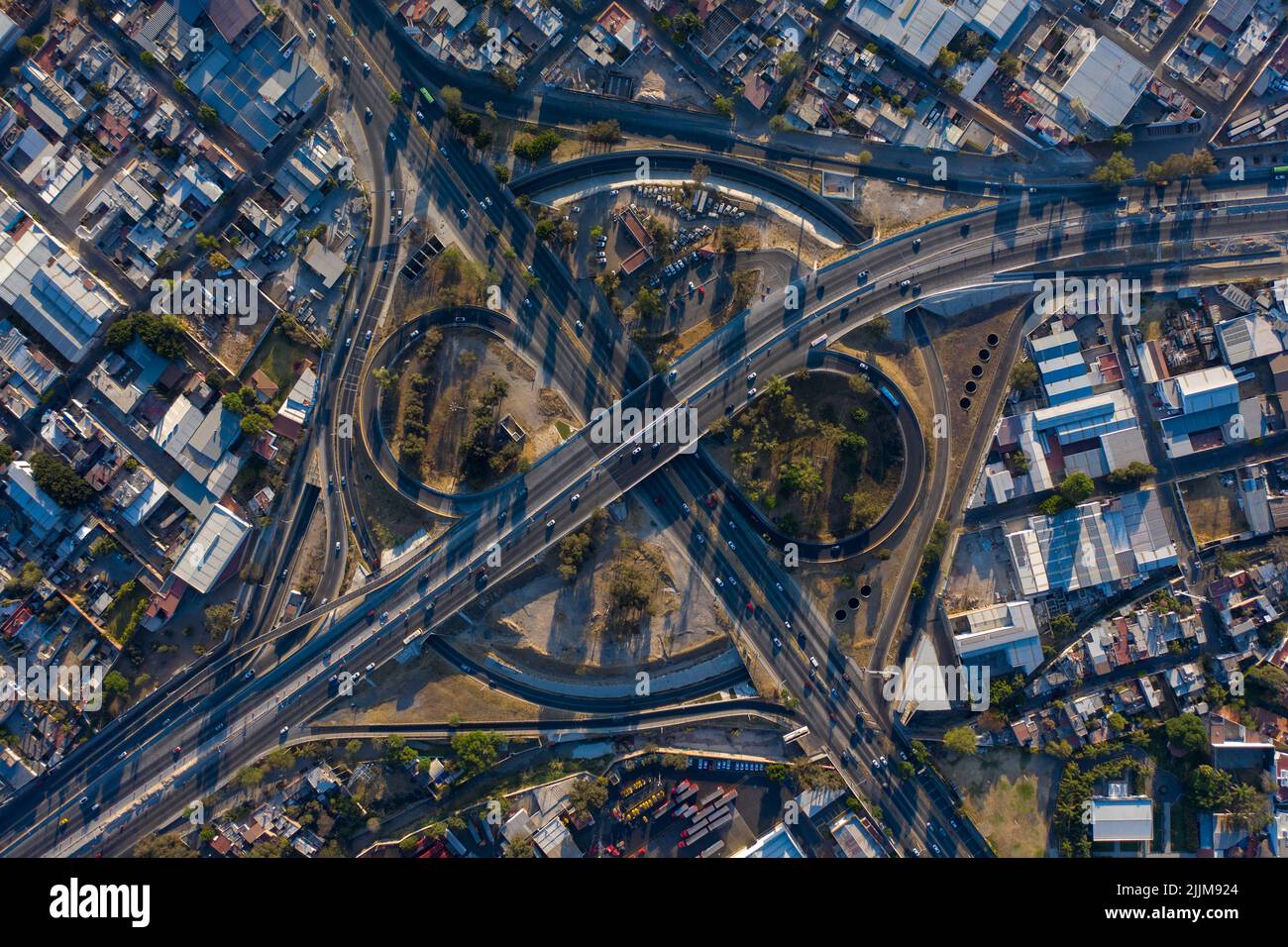 An aerial top view of a freeway interchange during a daytime Stock ...