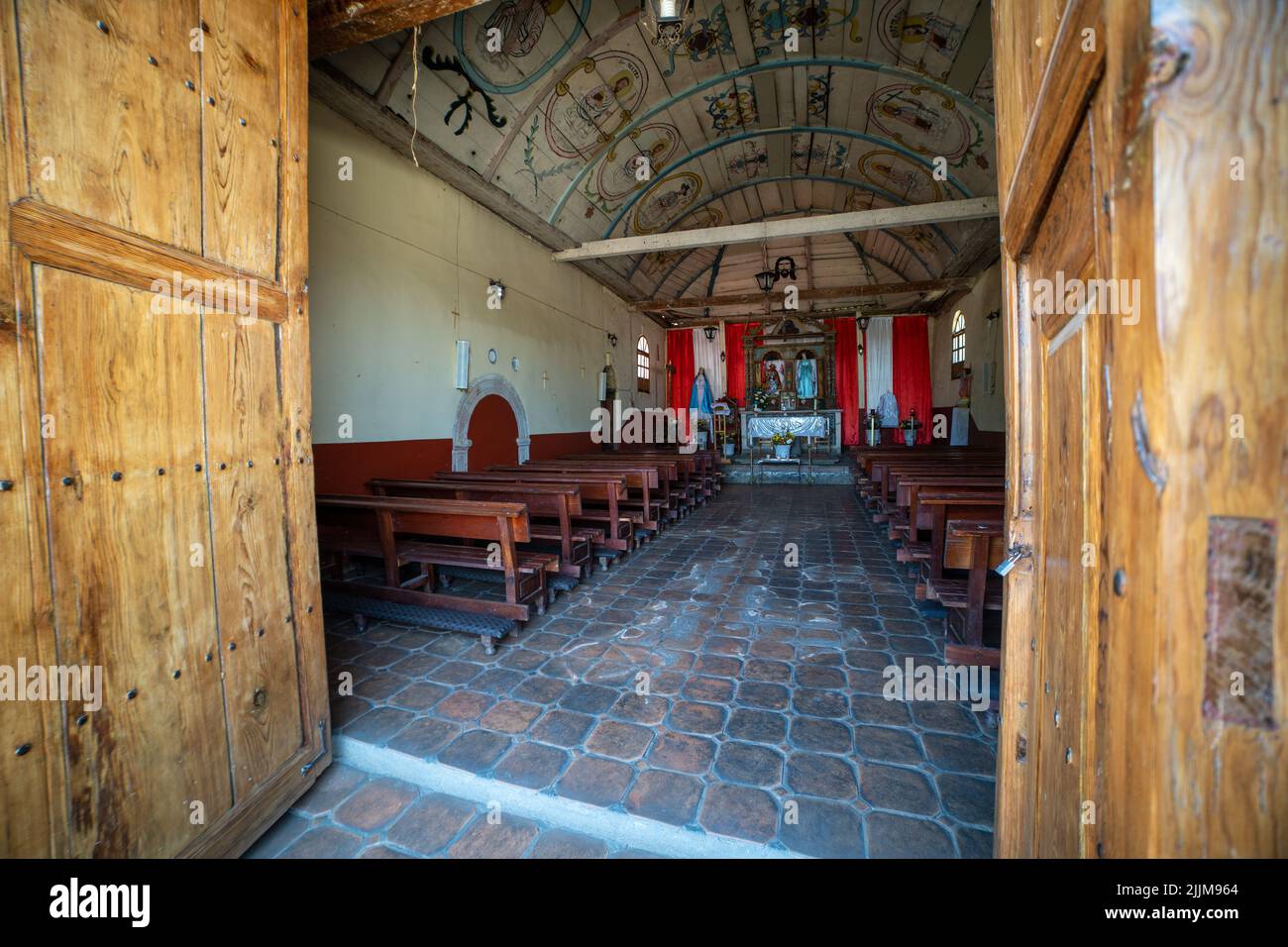 An inside shot of a temple with seats and the altar Stock Photo - Alamy