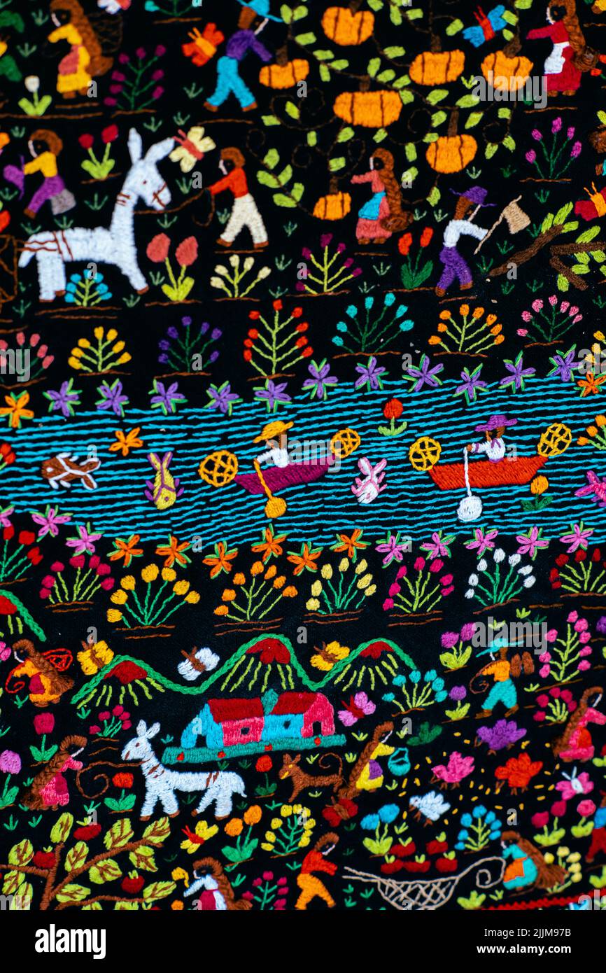 A closeup shot of a handmade colorful embroidered cloth Stock Photo - Alamy