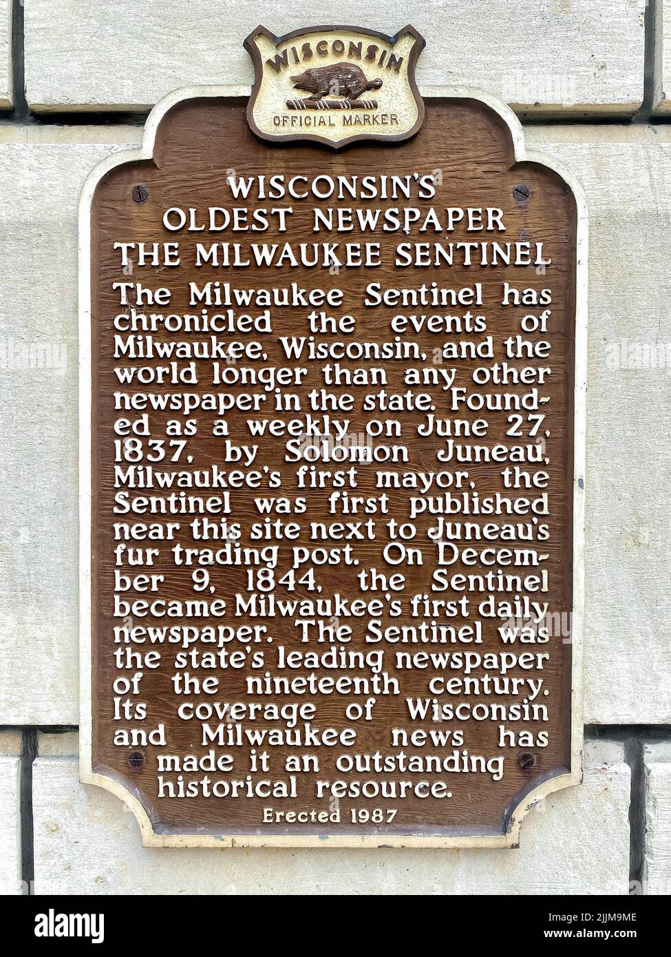 The Milwaukee Sentinel Historic Marker is displayed along the Riverwalk ...