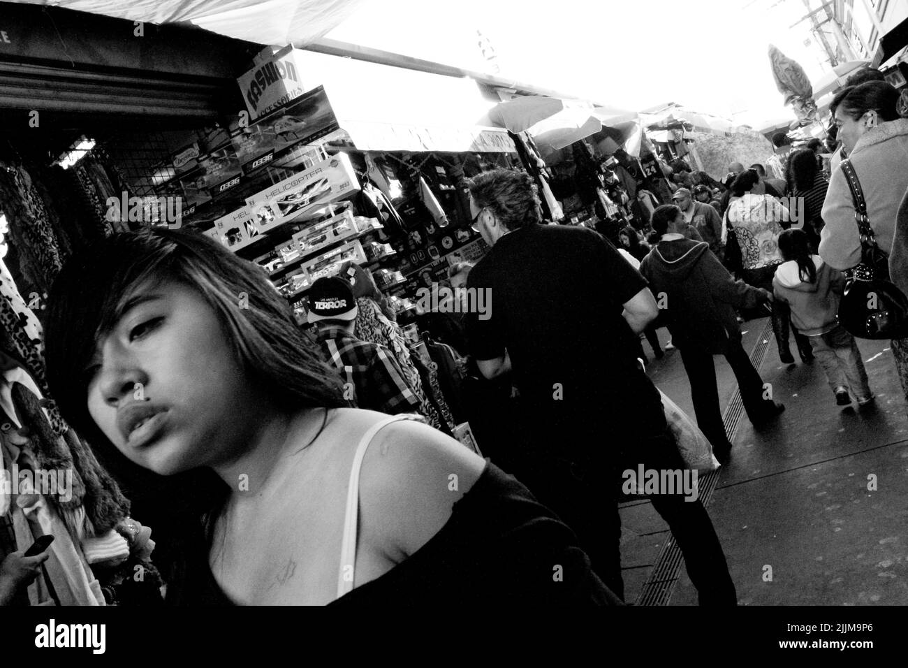 A Dutch angle shot of random people at downtown Los Angeles in ...