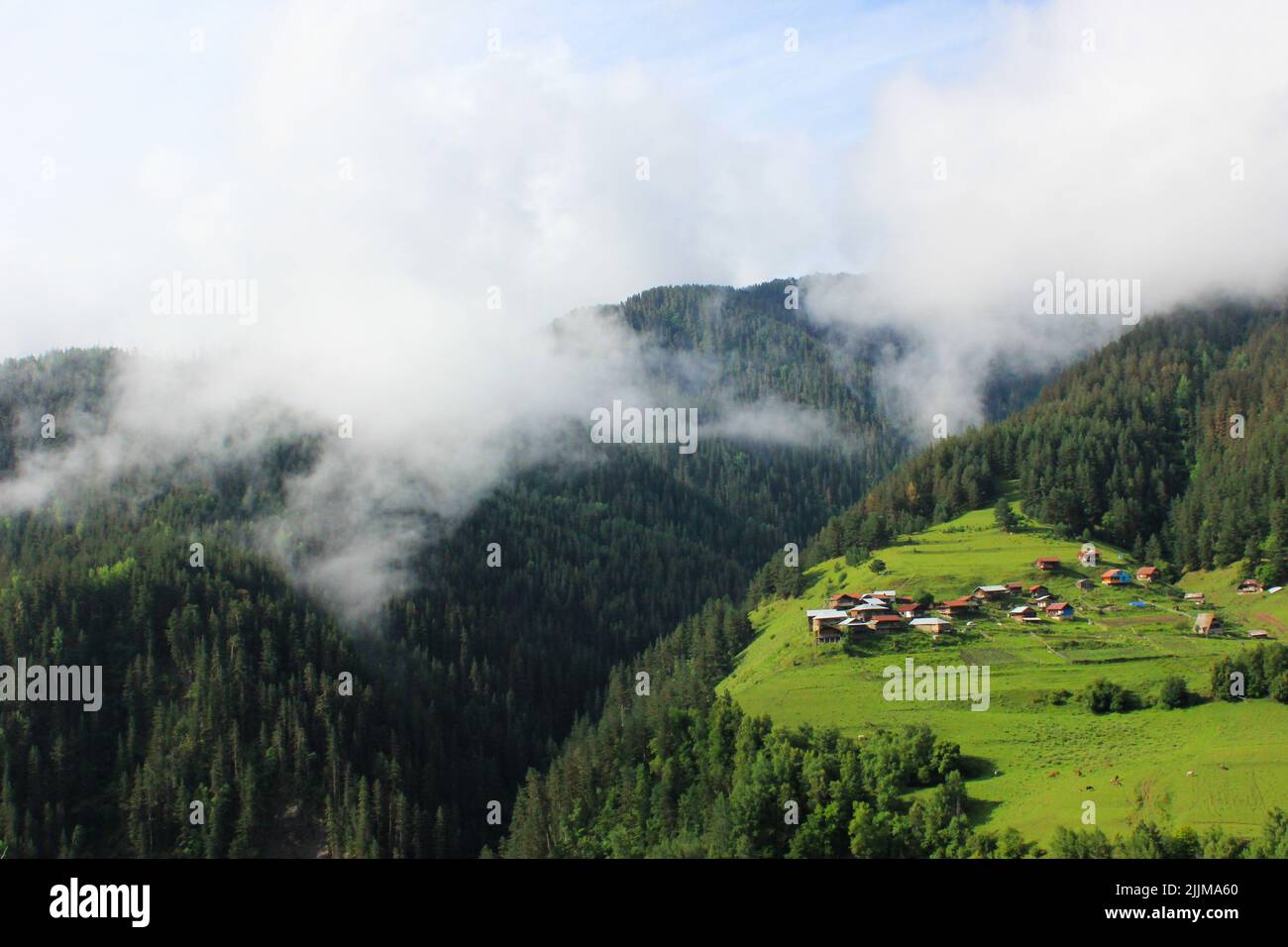 Small village surrounded mountains forests hi-res stock photography and ...