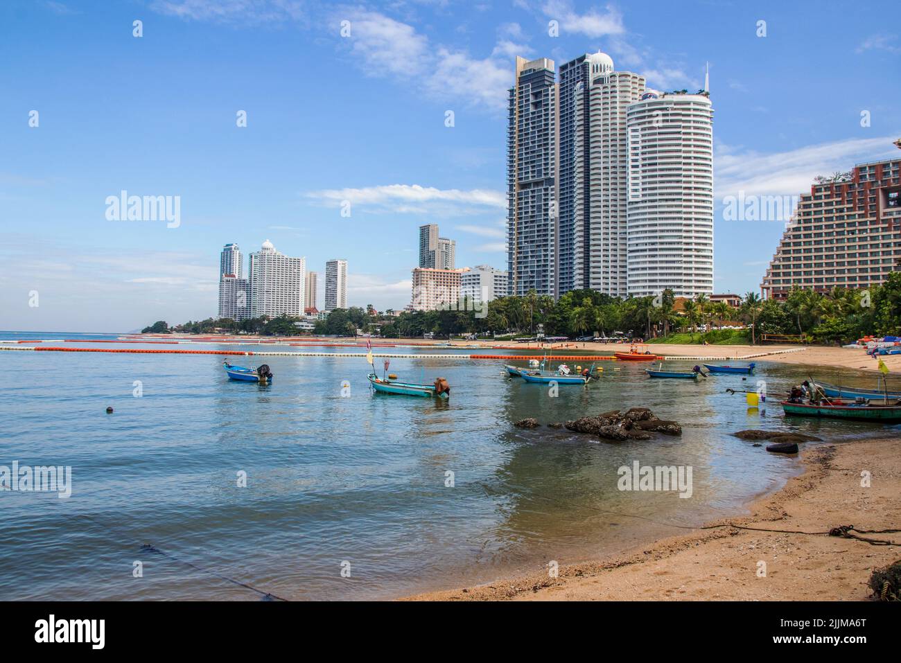 A view of Naklua beach in North Part of Pattaya in background of high ...