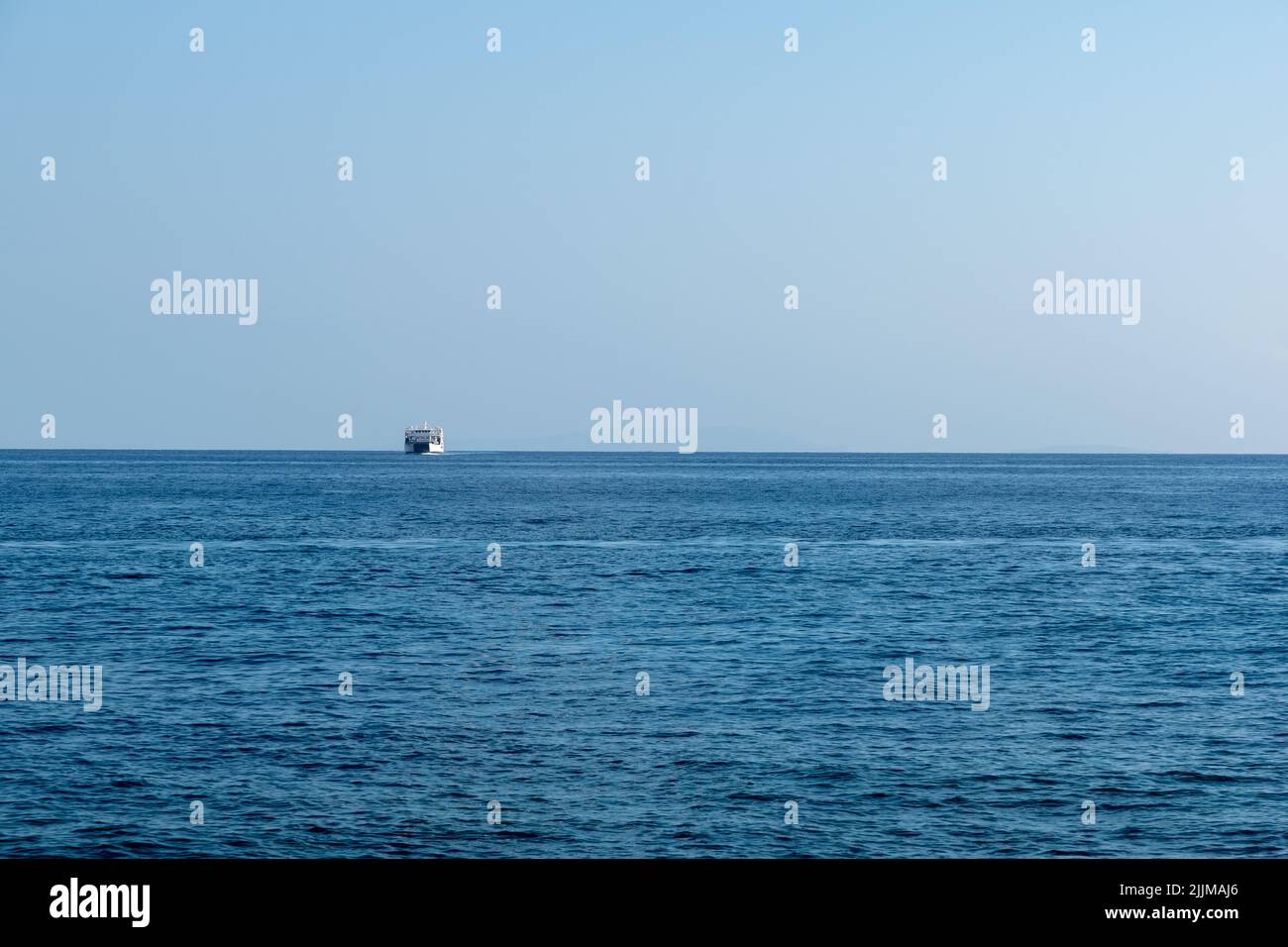 A beautiful view of the ocean with cloudless sky background Stock Photo ...