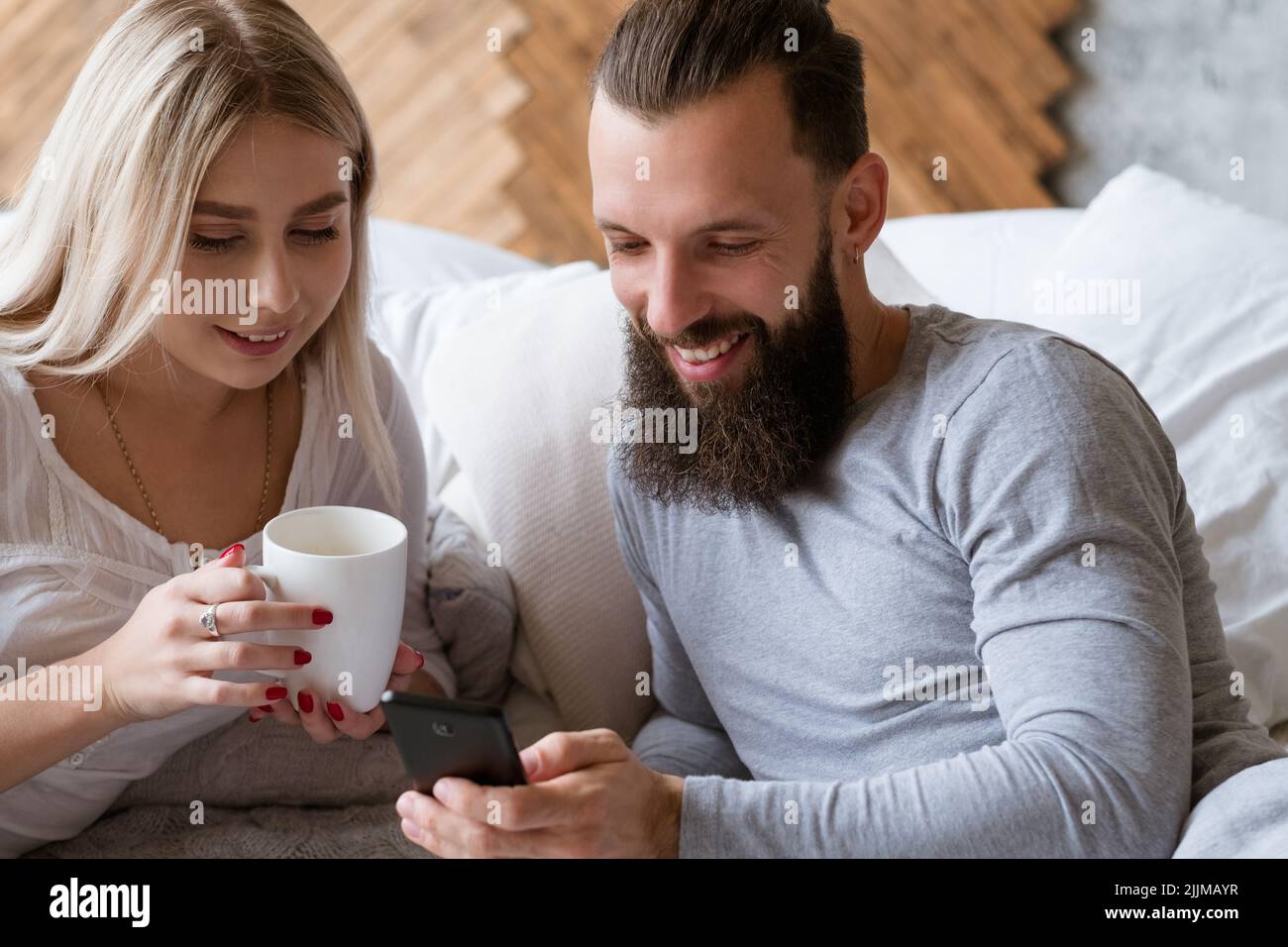 morning young couple discuss plan drink smartphone Stock Photo - Alamy