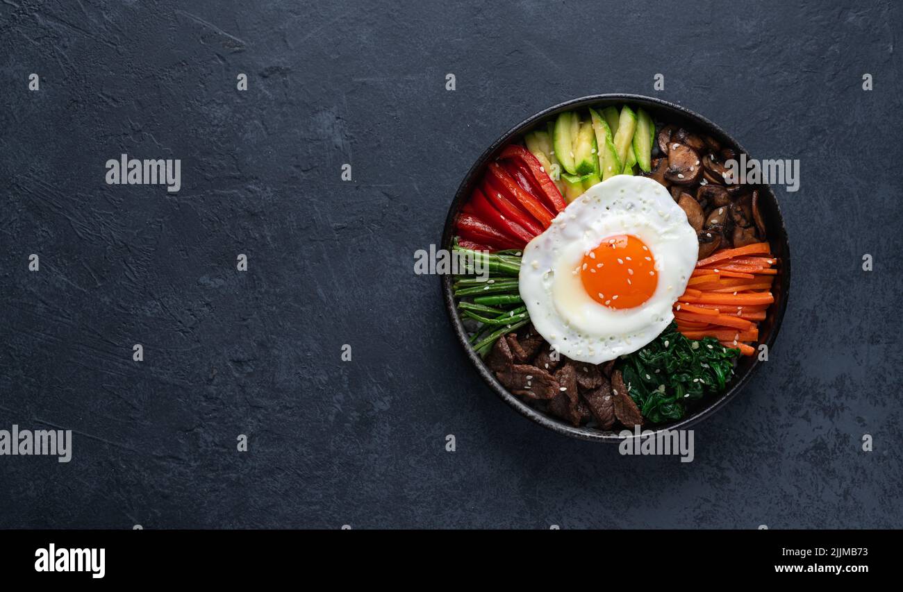 Bibimbap, traditional korean dish, top view Stock Photo - Alamy