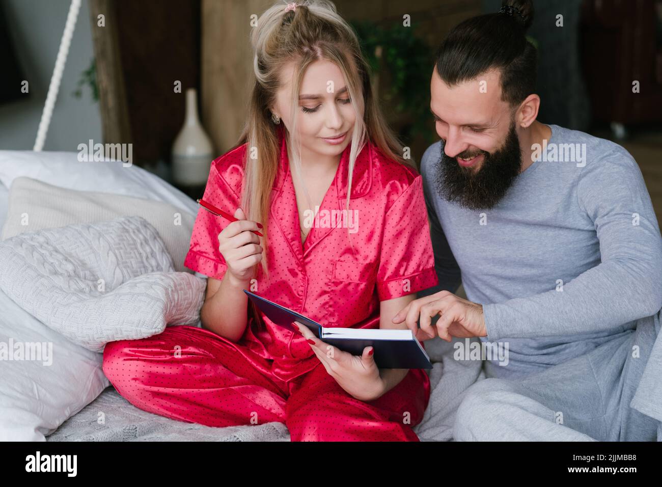happy together couple make holiday weekend plans Stock Photo - Alamy