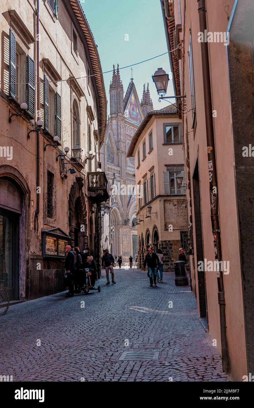The Domo Cathedral of Orvieto from a street in Tuscany, Italy Stock ...
