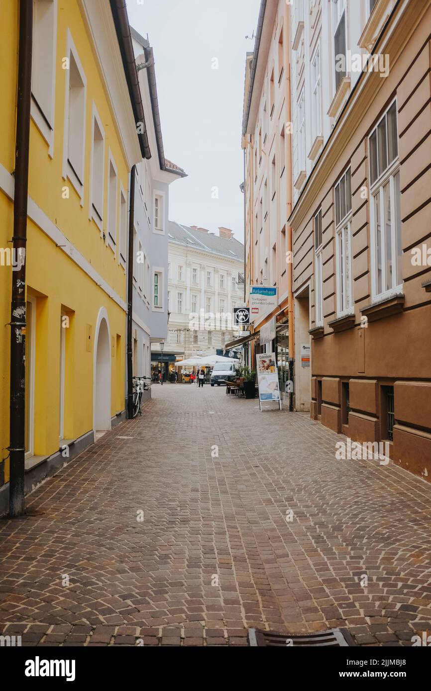 A route between urban buildings Stock Photo - Alamy