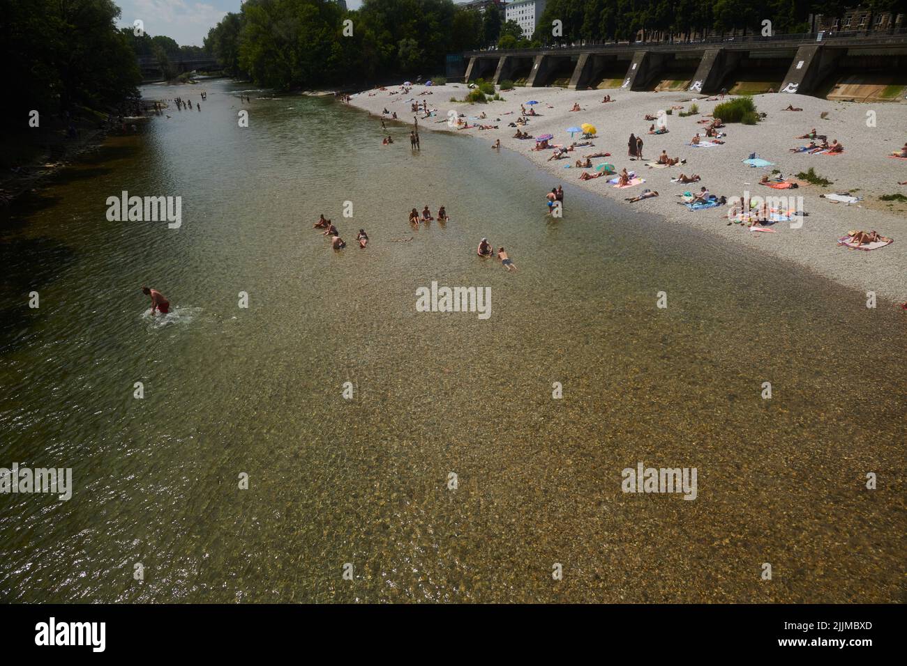 People enjoying bathing in the river Isar in the city of Munich Stock ...