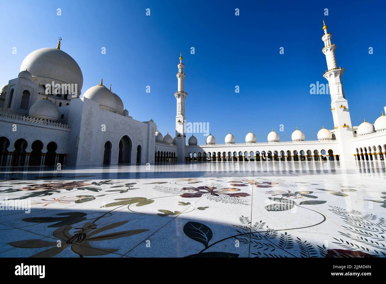 The side low angle shot of Sheikh Zayed Grand Mosque, Abu Dhabi, United ...