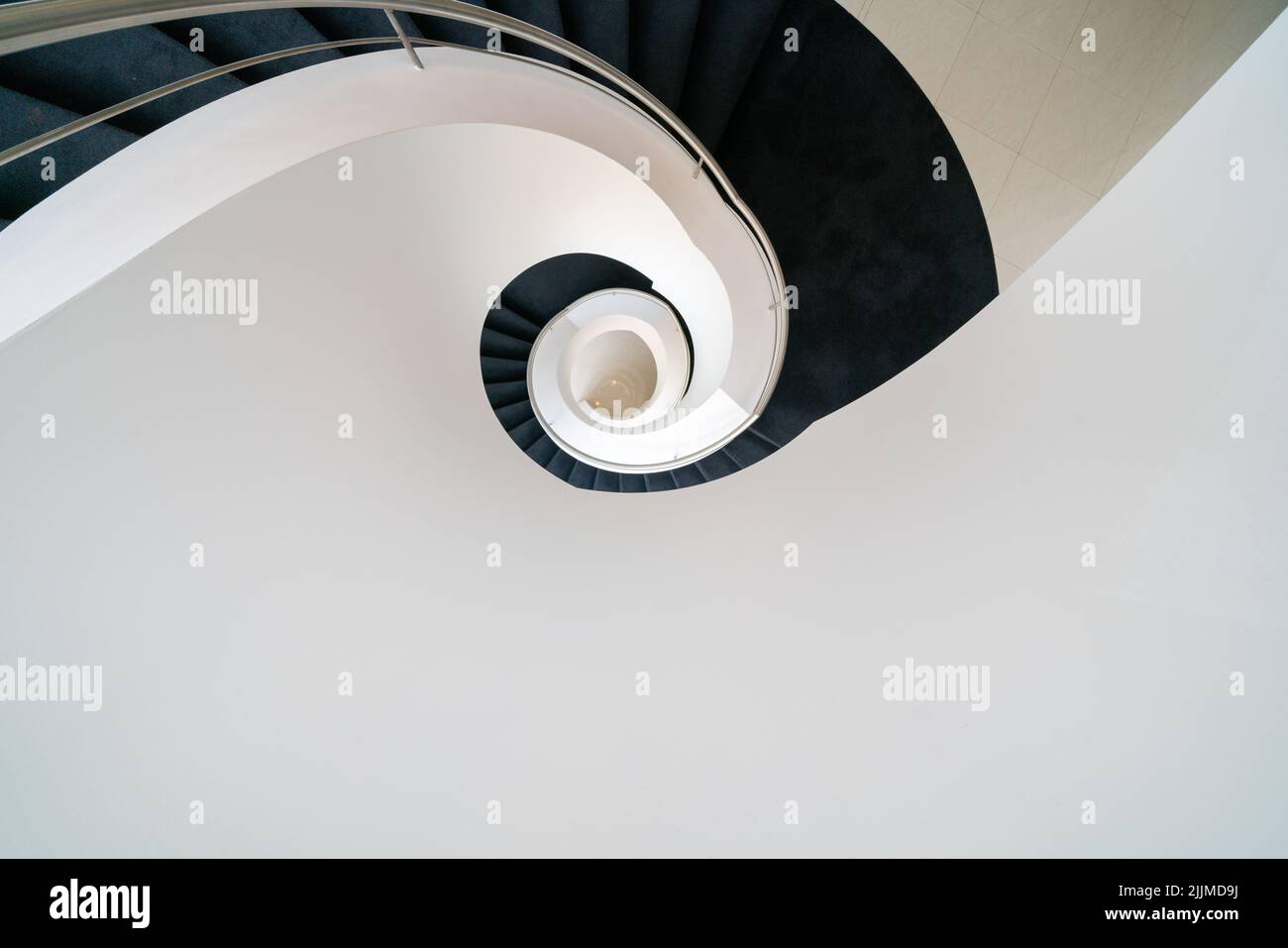 A top view of spiral stairs - background or wallpaper Stock Photo - Alamy
