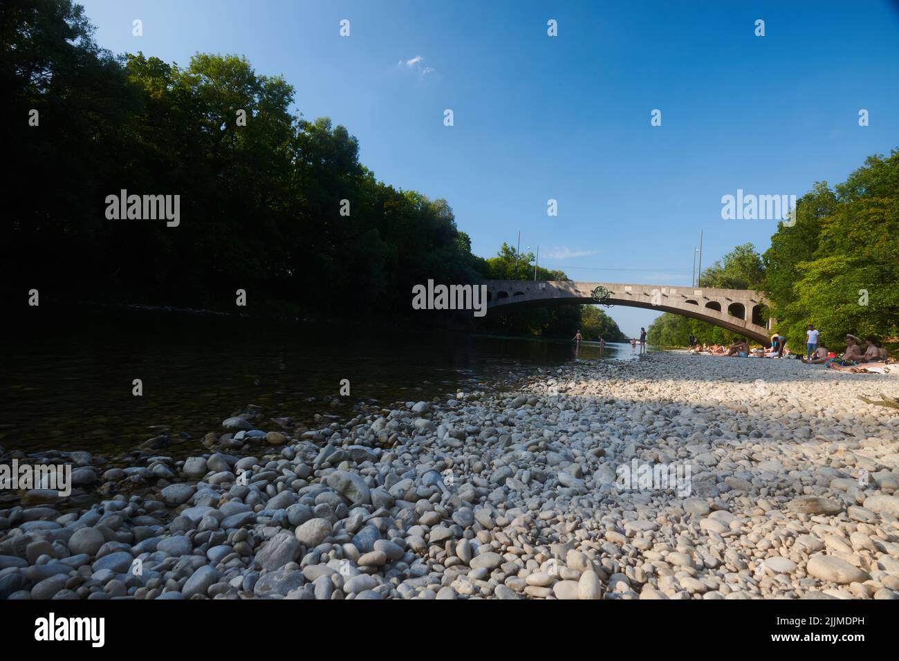People enjoying bathing in the river Isar in the city of Munich Stock ...