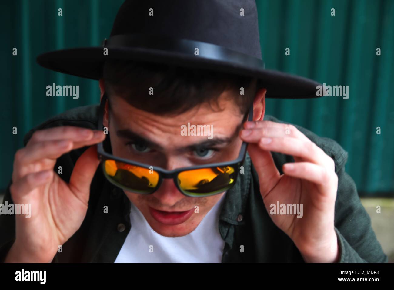 Defocus man wear sunglasses. Smiling fashion man. Portrait of handsome ...