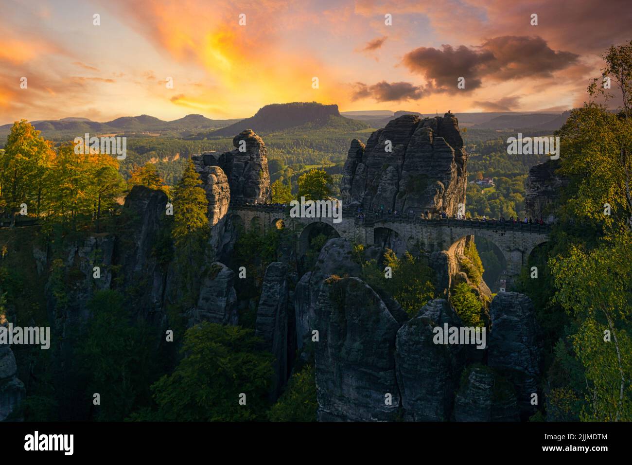 A beautiful landscape view of the Bastei bridge in the green forests ...