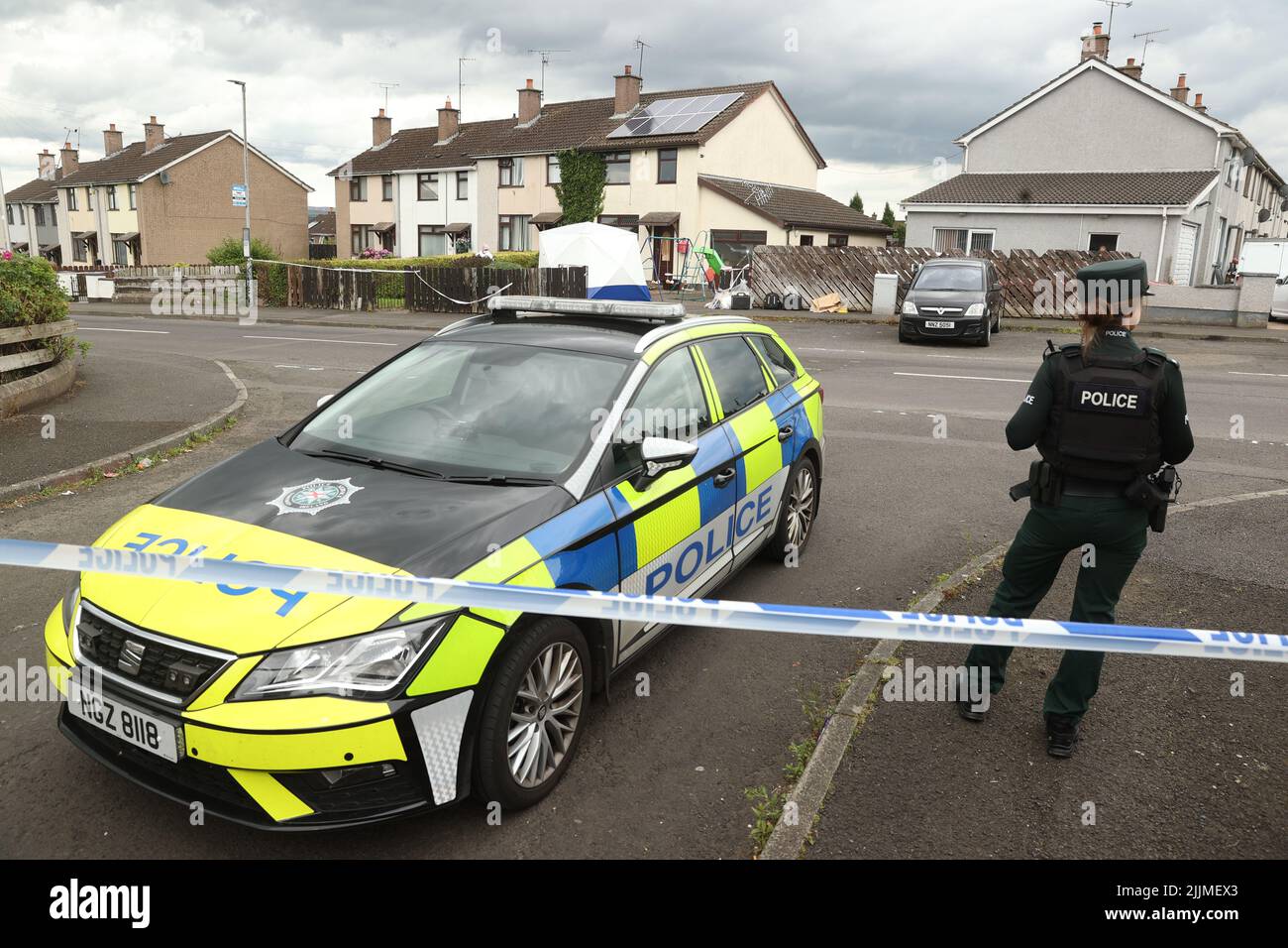 Police at the scene in Orkney Drive in Ballymena after a body was ...