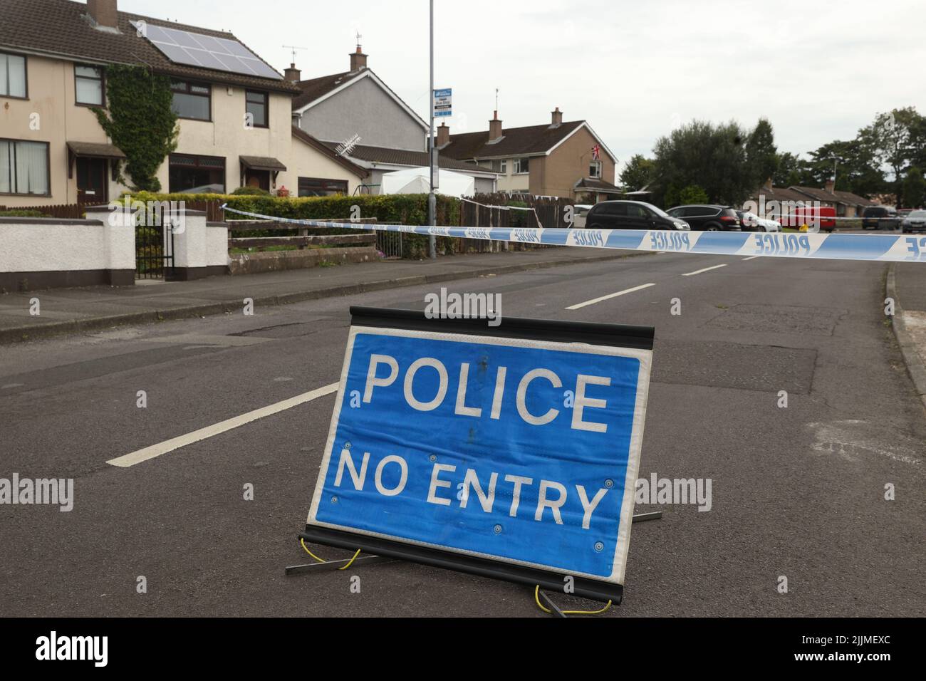 A police sign at the scene in Orkney Drive in Ballymena after a body ...
