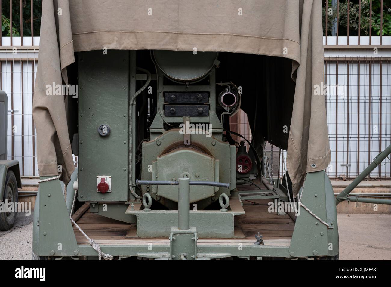 A detail of a military trailer with a generator set Stock Photo - Alamy