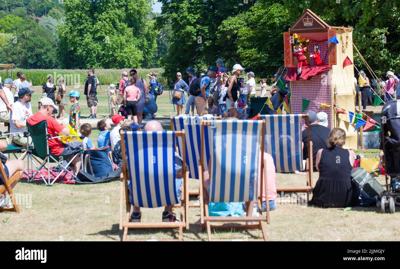 Britain, July 2022. Family Crowds and audience enjoying a traditional ...