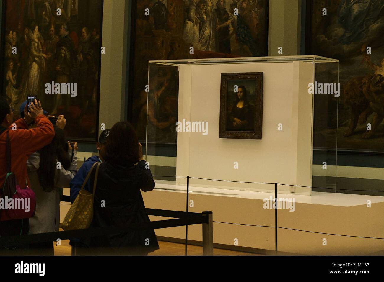 The Mona Lisa and tourists in the Louvre Museum, Paris, France Stock ...