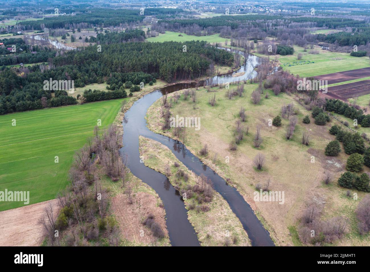 Aerial view of Liwiec River near Starowola village in Masovian ...
