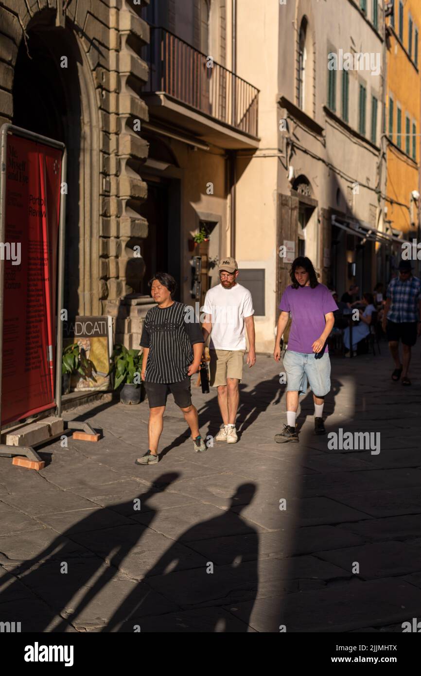 Cortona, Italy - July 15, 2022: people on the street in the small ...