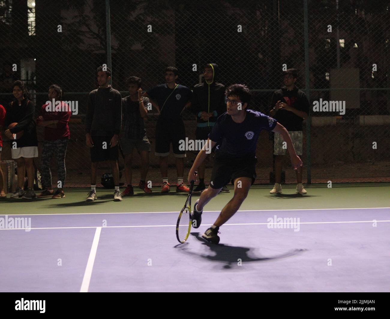 A closeup of a tennis player hitting the ball Stock Photo - Alamy