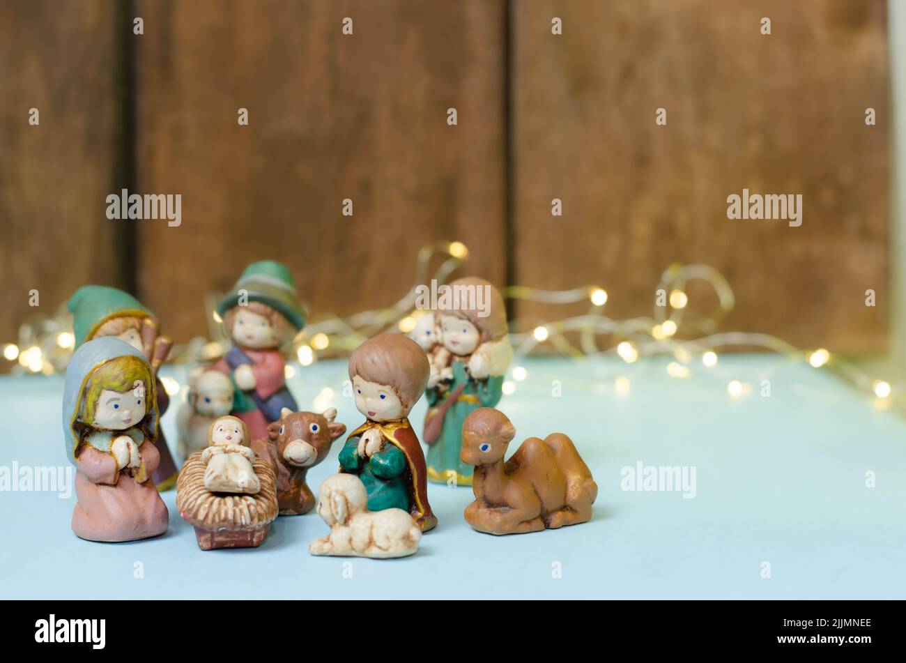A close-up shot of mini colorful figures of the Nativity scene on a ...