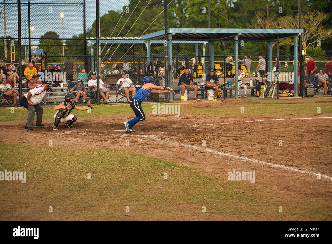 Some softball players during the game Stock Photo - Alamy