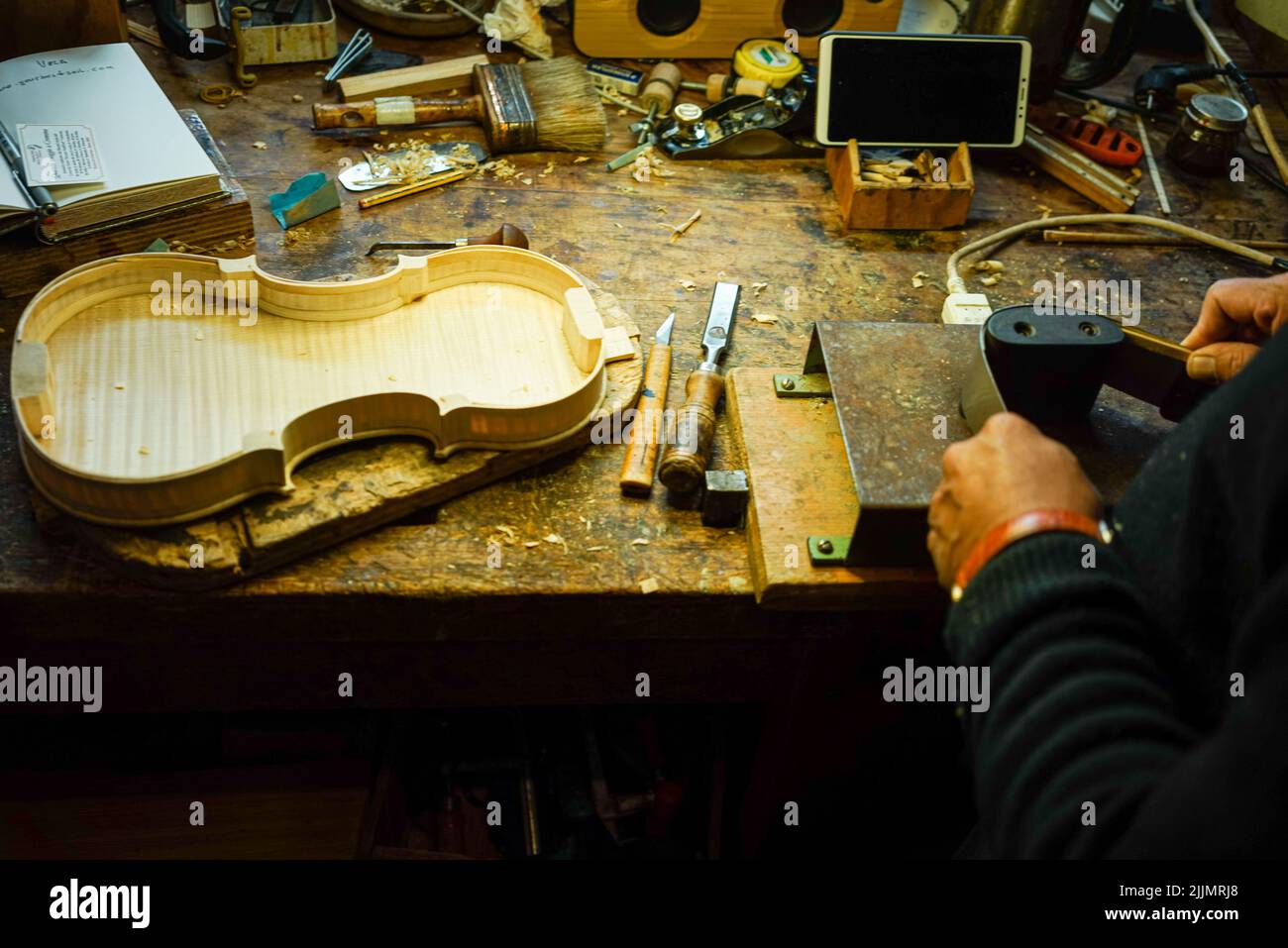 The inside view of Carlos Roberts violin maker luthier's lab in Cremona ...