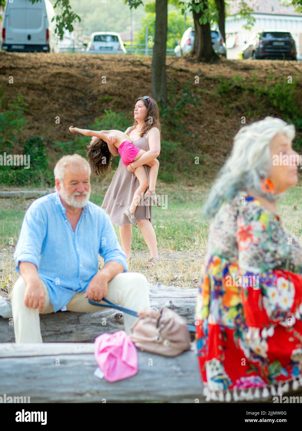 Summertime, nice family, senior Daddy, Mom, their daughter and grand ...