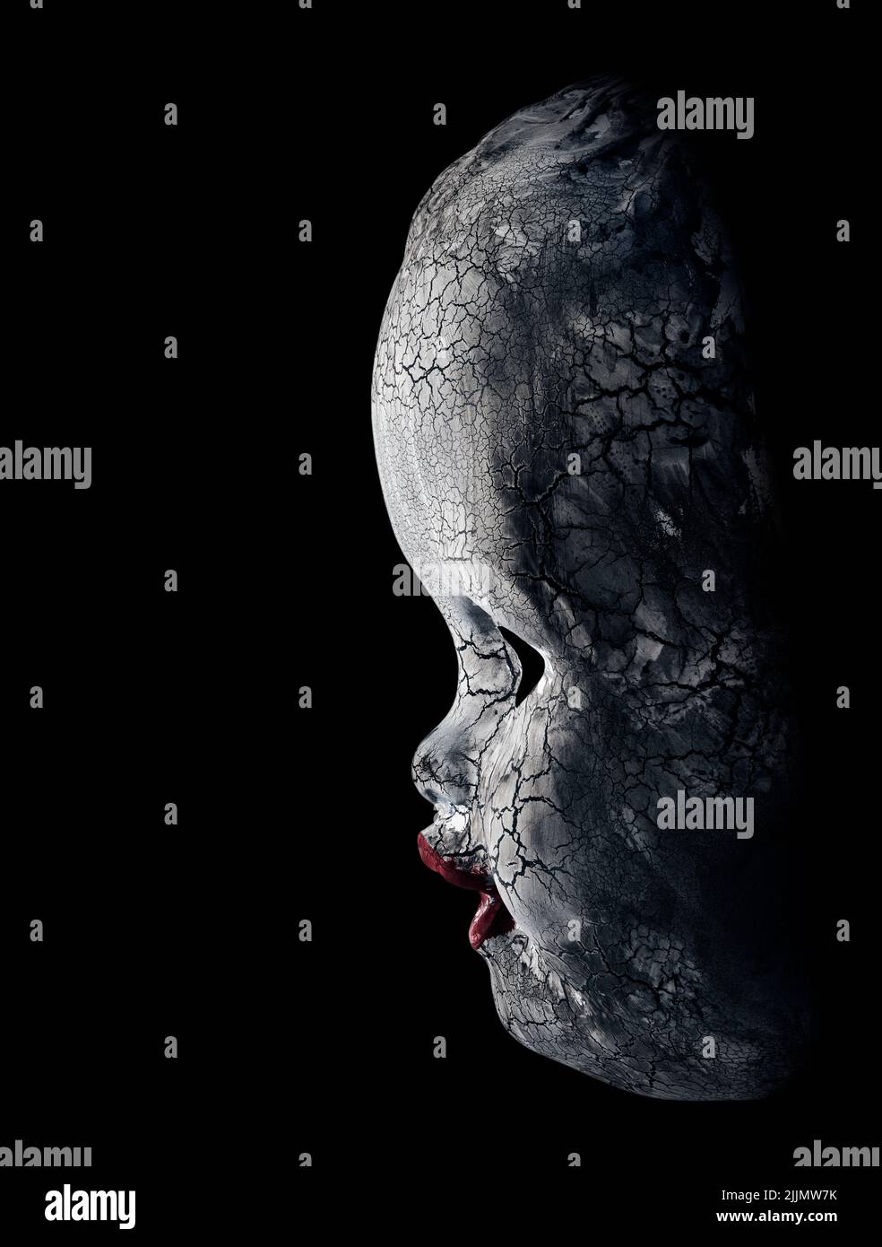 Old cracked creepy doll head isolated on black background Stock Photo ...