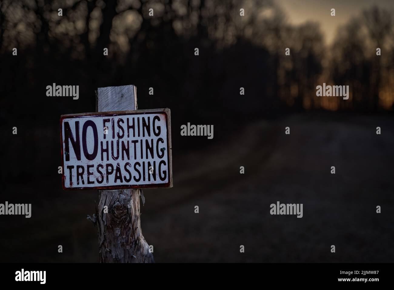 A sign of no fishing, hunting and trespassing Stock Photo - Alamy